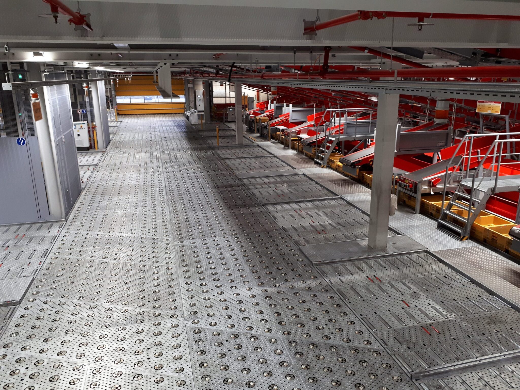 ULD Handling System for DHL Hub at Leipzig Halle Airport - SACO Airport ...